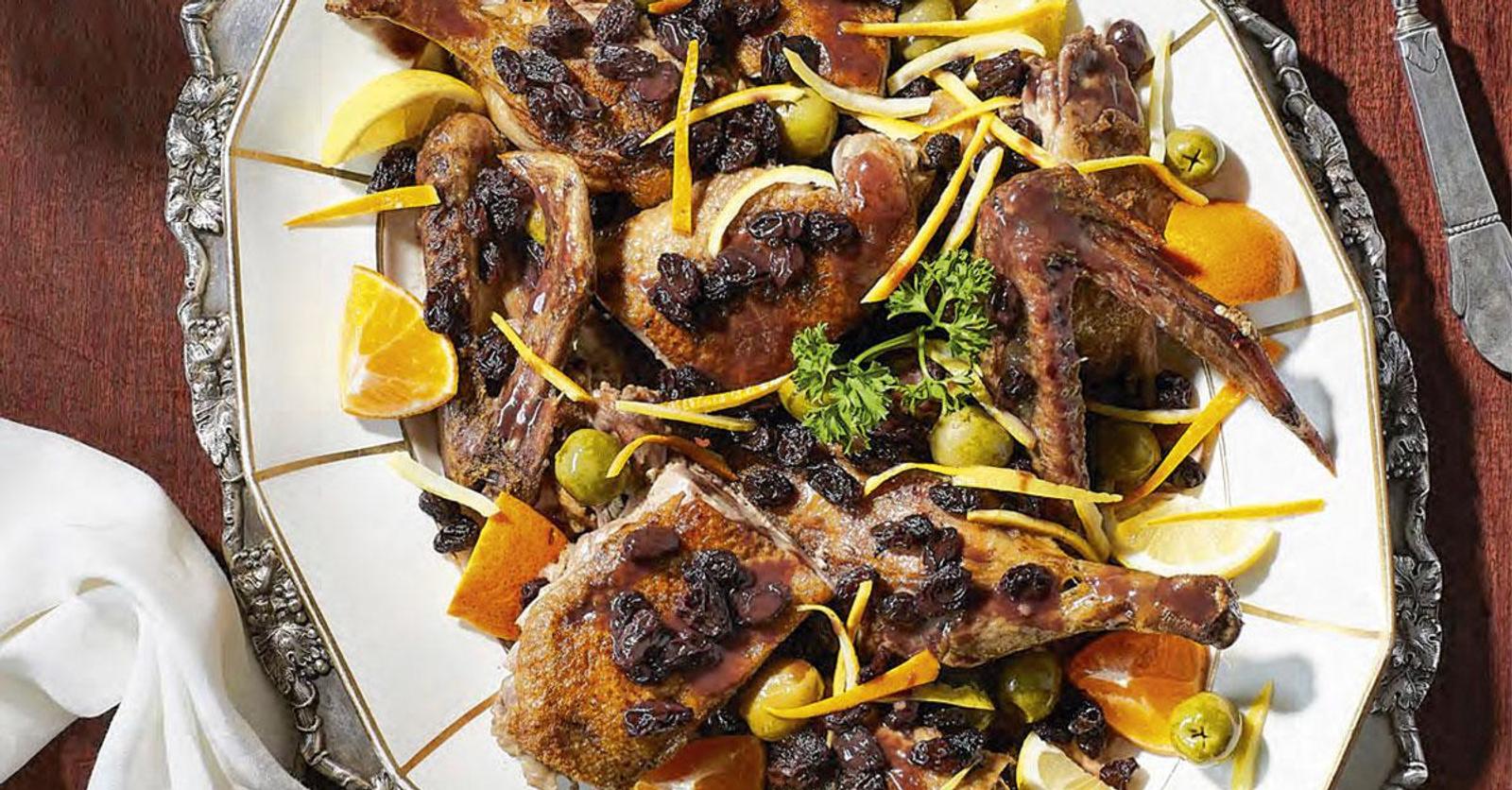 Duck with orange, lemon and olives